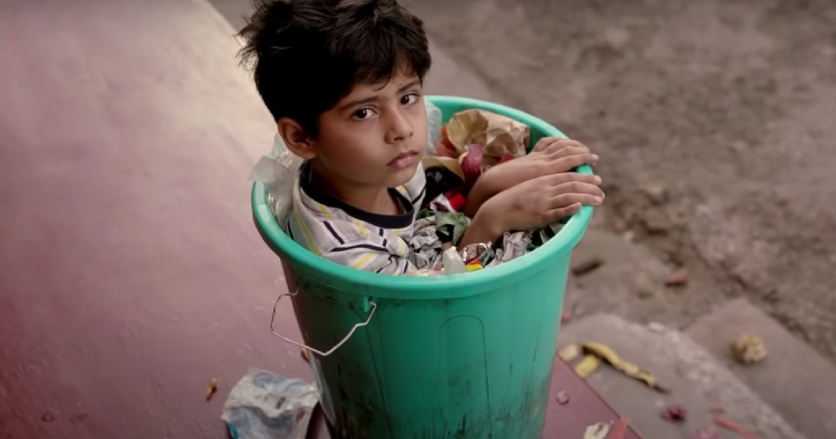 Stuck in a Trash Bin, Boy Refuses to Get Out